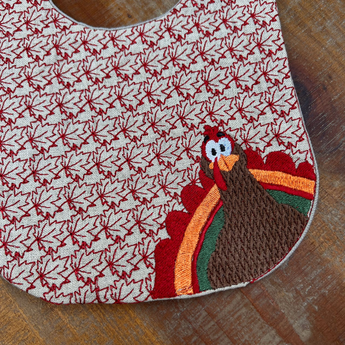 Peaking Turkey Bib Embroidery Design| sproutembroiderydesigns